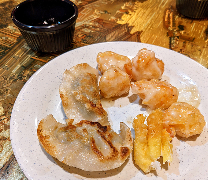 These golden-fried dumplings and tempura shrimp aren't just appetizers &ndash; they're the opening act to a magnificent culinary concert.