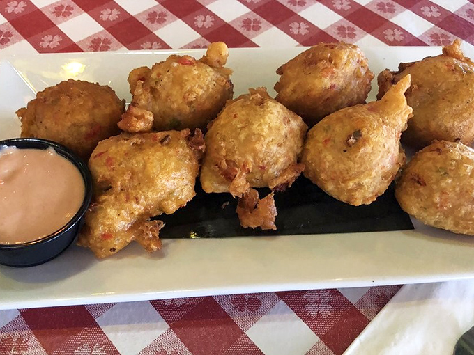 Conch fritters: golden-brown spheres of happiness that make you wonder why you ever wasted time on ordinary hush puppies.