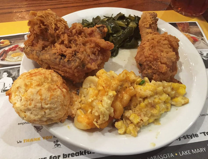 Golden fried chicken with collard greens, mac and cheese, and creamy corn casserole&mdash;a Southern comfort feast that makes Monday feel like Sunday dinner.