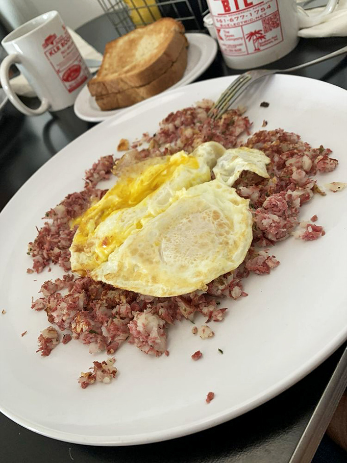 When corned beef hash meets perfectly runny eggs, magic happens on your plate and in your heart.