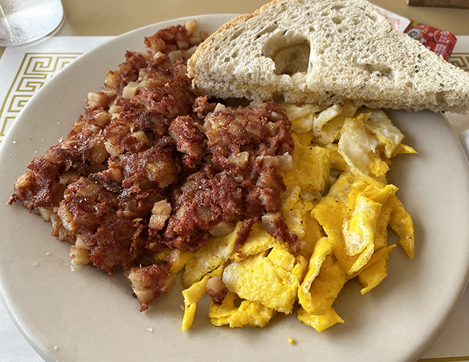 Corned beef hash with that magical crispy-to-tender ratio that would make your grandmother both jealous and proud.