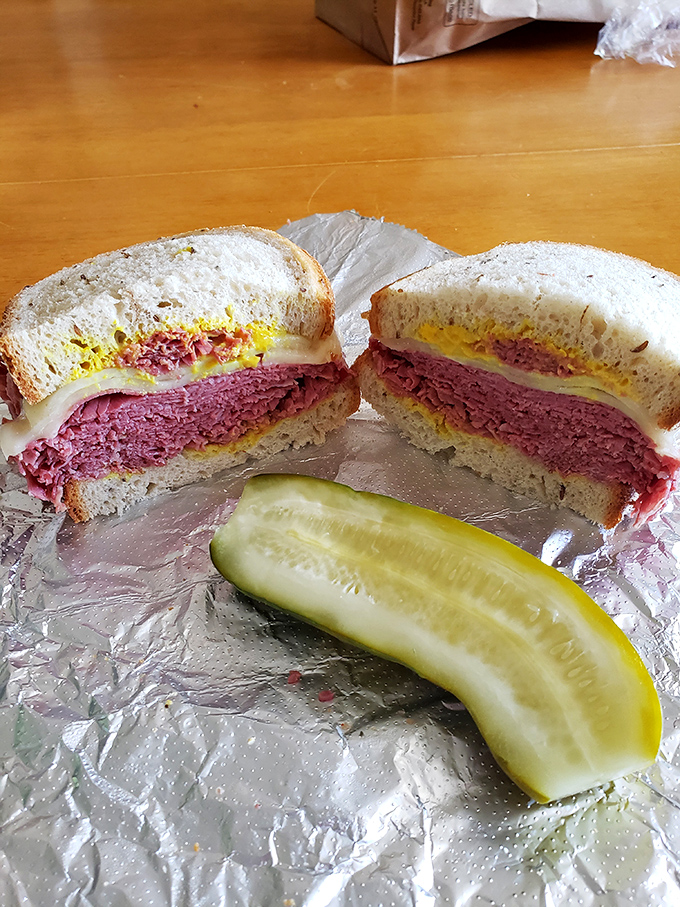 This isn't just a sandwich—it's architecture. The structural integrity of that corned beef stack deserves an engineering award.