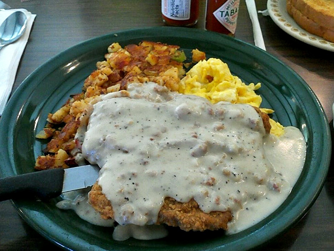 Country fried steak: where breakfast meets comfort food and they decide to throw a party on your plate. That gravy deserves its own zip code.
