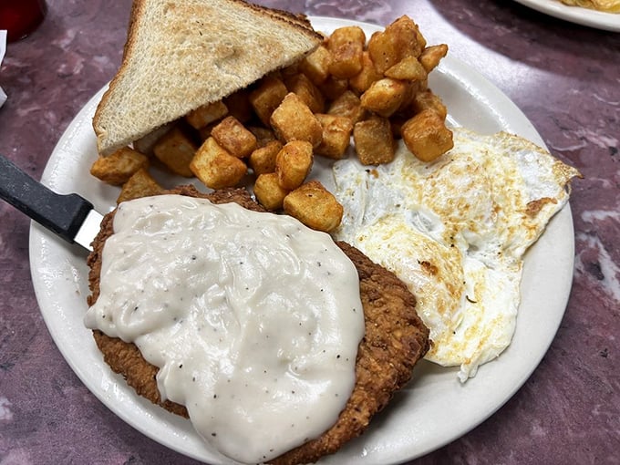 Country fried steak with all the fixings proves that some meals are worth loosening your belt for afterward.
