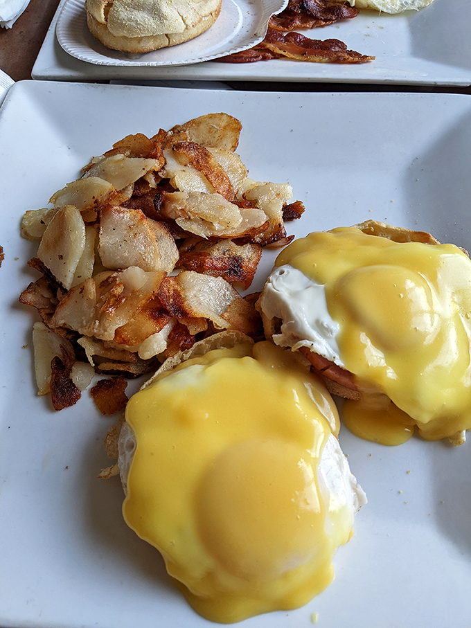 Hollandaise sauce cascading over poached eggs like a golden waterfall&mdash;Benedict Arnold may have been a traitor, but Eggs Benedict is forever loyal.