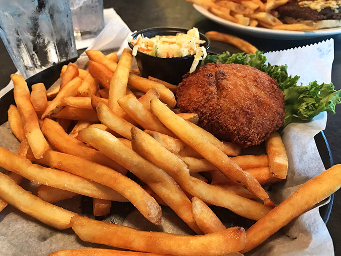 Golden-fried perfection meets hand-cut fries. This crab cake doesn't need fancy plating&mdash;it lets its flavor do all the talking.