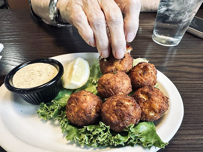 These crab cake spheres of joy could make a Maryland native weep with happiness. The perfect ratio of crab to breading is culinary mathematics at its finest.