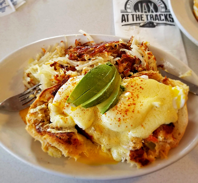 Eggs Benedict gets the California treatment with fresh avocado and perfectly poached eggs &ndash; breakfast architecture at its finest.