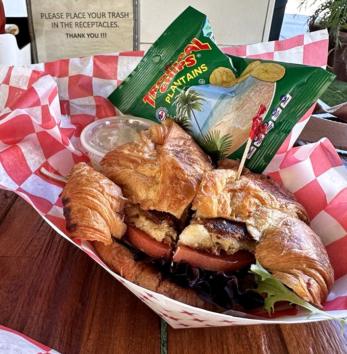 This croissant sandwich isn't just crossing borders—it's creating a United Nations of flavor with golden-brown crab cake diplomacy.