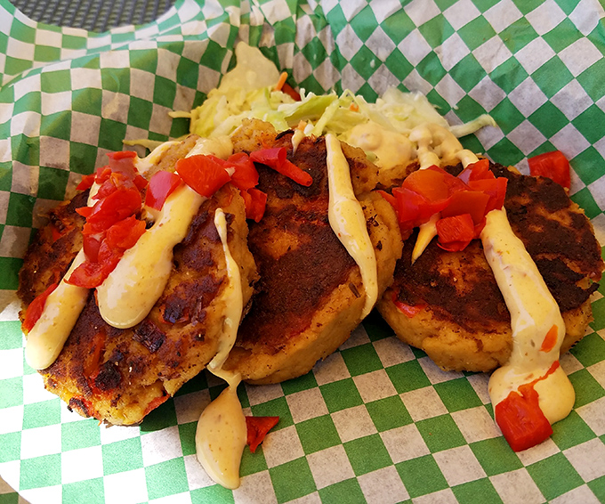 These crab cakes aren't playing around &ndash; beautifully seared and topped with a sauce that makes you wonder why you'd order anything else.