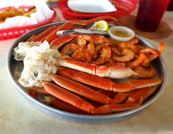 Snow crab legs and shrimp that look like they jumped from the ocean to your plate. The kind of seafood feast that justifies wearing a bib.