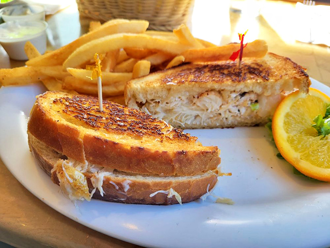 The perfect crab sandwich: where buttery grilled sourdough meets sweet crab meat in a coastal romance story told one bite at a time.