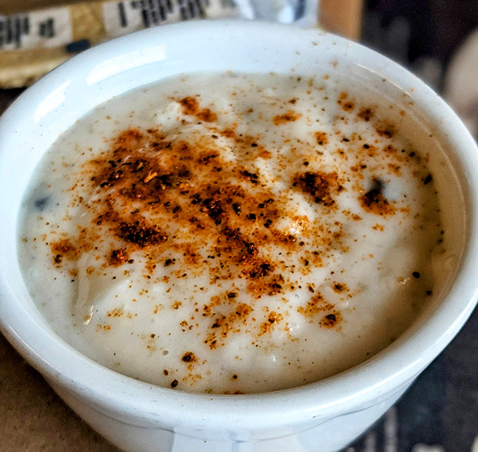 A bowl of creamy crab bisque that's worth the drive alone, dusted with spices that whisper, "Yes, this is the real deal."