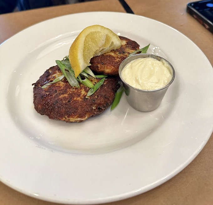 These crab cakes don't mess around with unnecessary fillers. Just pure, seasoned crab that flakes apart with the gentlest nudge of your fork.