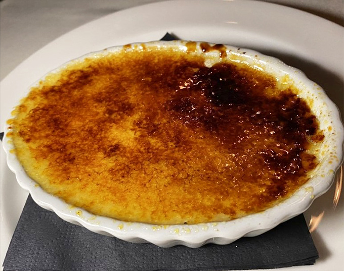 Cr&egrave;me br&ucirc;l&eacute;e with a perfectly shattered sugar top&mdash;the culinary equivalent of that satisfying feeling when you step on a crunchy autumn leaf.