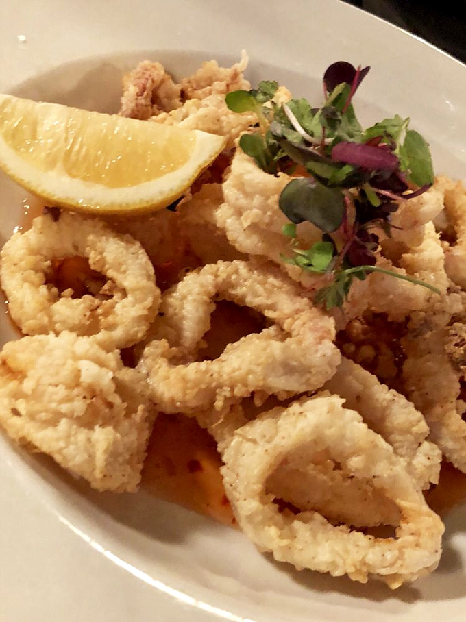 Golden-fried calamari that crackles with each bite, proving that seafood can find happiness in the Arizona desert after all.