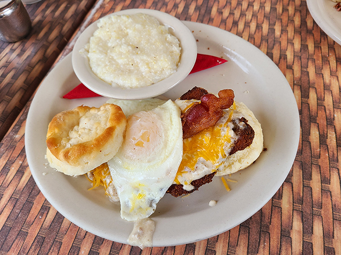 Breakfast architecture at its finest. That sunny-side egg perched atop bacon and cheese creates the breakfast sandwich equivalent of a perfect sunrise. 