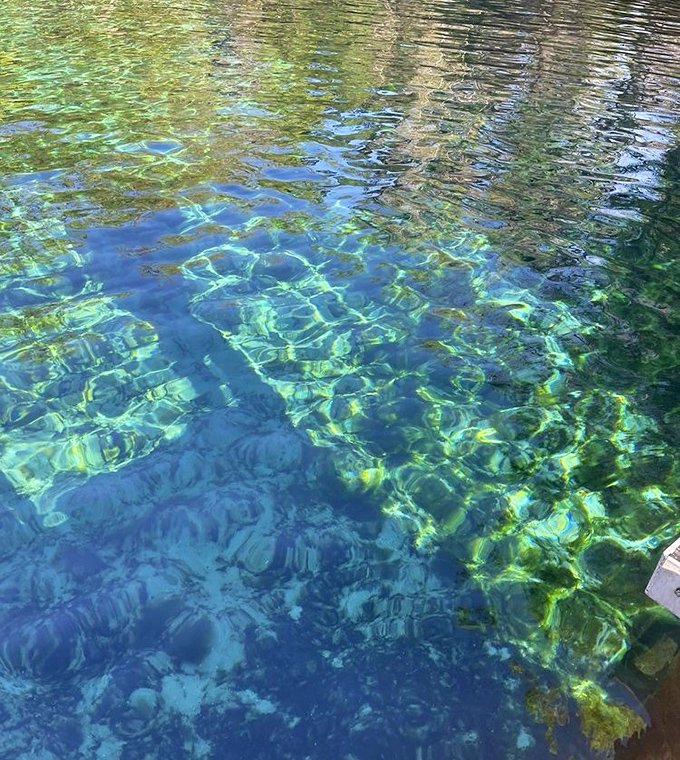 Mother Nature's stained glass window &ndash; sunlight dancing through water so clear you'd swear someone forgot to fill the pool.