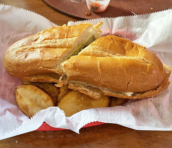 A proper Cuban sandwich served with home fries &ndash; the kind of honest, unpretentious lunch that makes you wonder why you ever eat anything else.