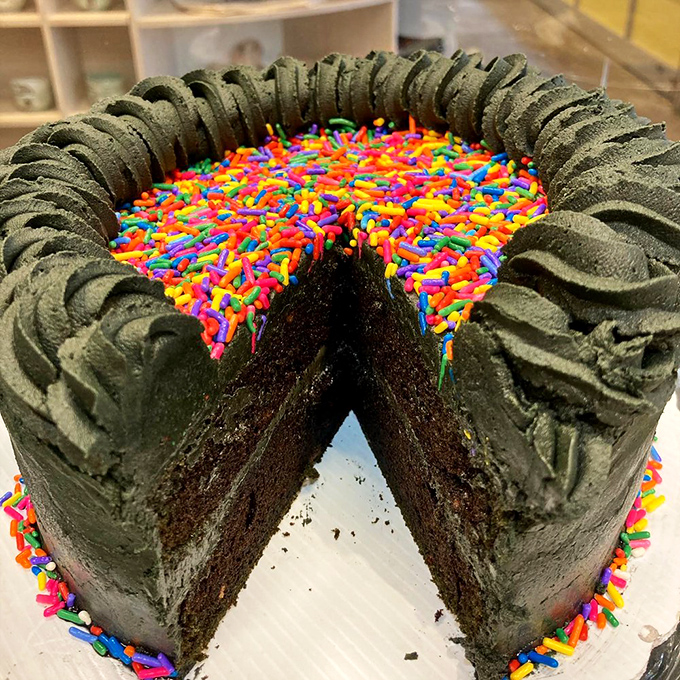 This chocolate masterpiece crowned with rainbow sprinkles proves that sometimes the best celebrations come in cake form.