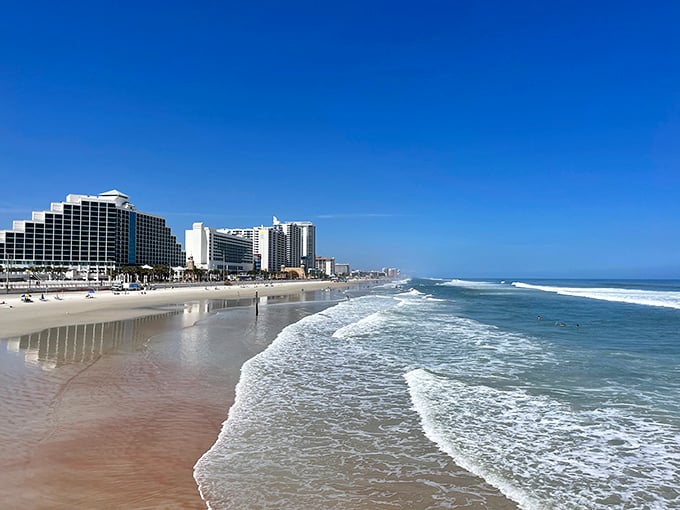 The hard-packed sand meets gentle waves in nature's perfect compromise. Here's where your morning walks come with complimentary dolphin sightings. 