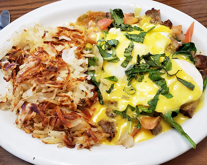 This isn't just any Denver omelet&mdash;it's a masterclass in texture, with those perfectly crispy hash browns playing the ideal supporting role to eggs that practically glow.