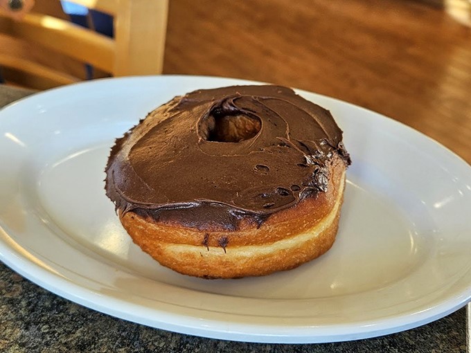 This chocolate-topped donut isn't just breakfast—it's an edible argument against starting your day with anything sensible like oatmeal.