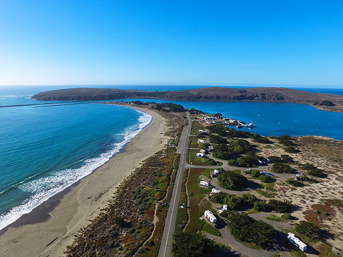 Highway 1 hugs the coastline like an old friend. Doran Beach stretches into the distance, offering miles of unspoiled shoreline for beachcombers.