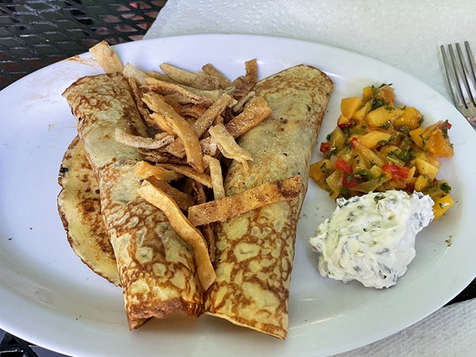 Duck crepes that would make Julia Child weep with joy, proving elegance thrives in unexpected places.