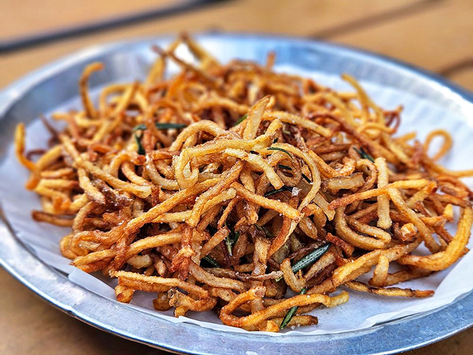 These aren't your average fries&mdash;they're a tangle of crispy, golden potato strands that crunch with each bite, making regular fries seem like a distant, inferior memory.