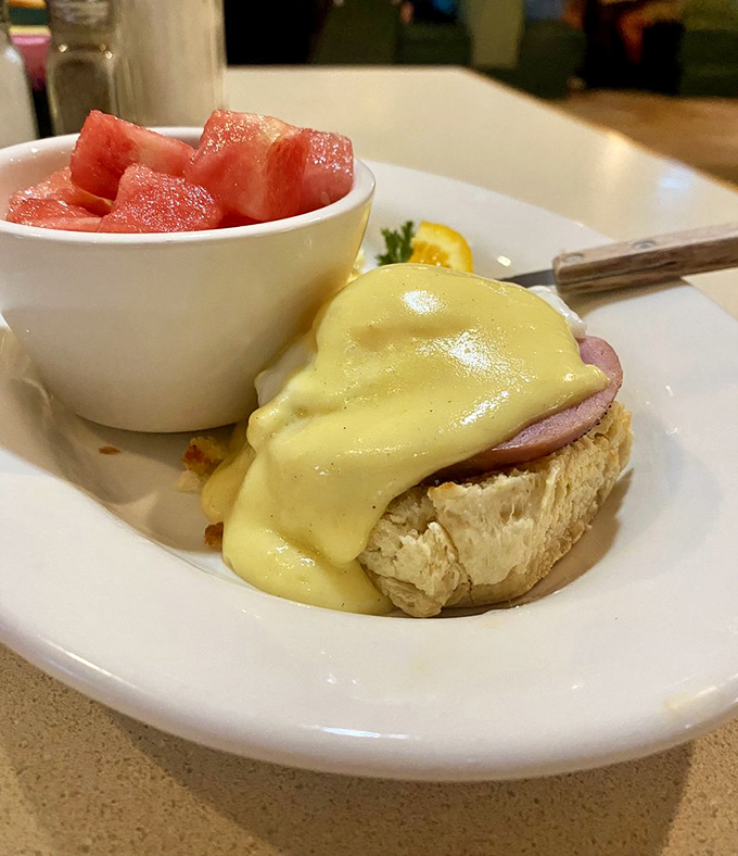 Eggs Benedict gets the Southwest treatment atop a buttery biscuit, with fresh watermelon providing that perfect sweet counterpoint.