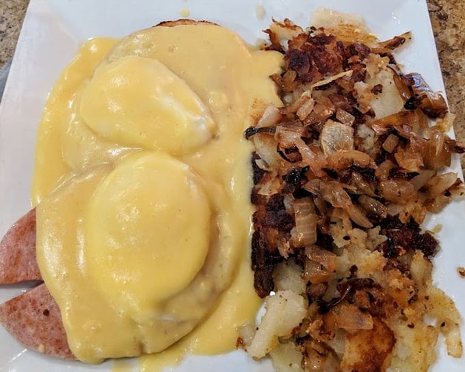 Eggs Benedict done right &ndash; perfectly poached eggs draped in hollandaise that's rich enough to have its own investment portfolio, with crispy home fries playing backup.