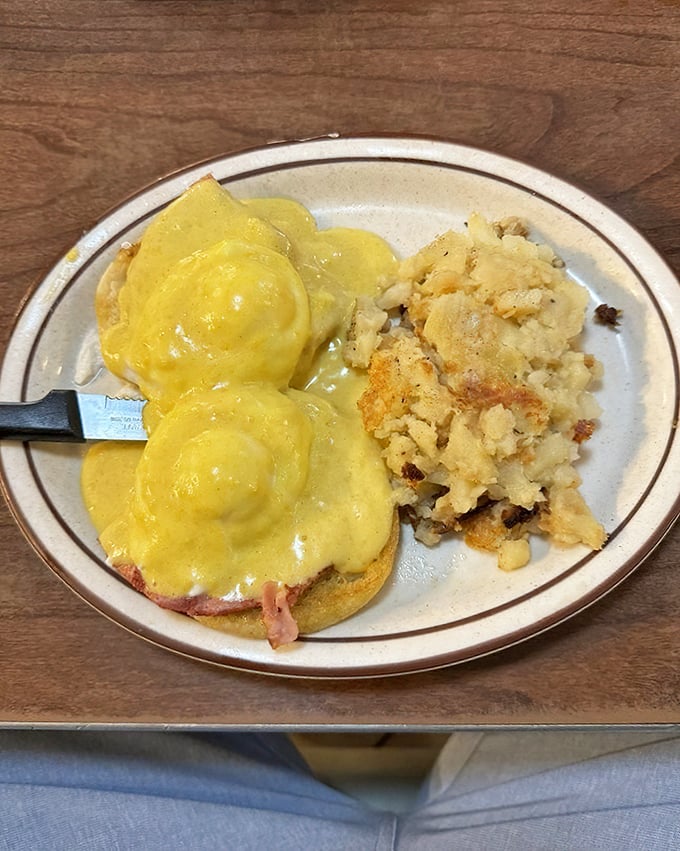 Eggs Benedict that would make the Pope jealous&mdash;perfectly poached eggs nestled on ham, draped in hollandaise, with hash browns that achieve the crispy-fluffy paradox.