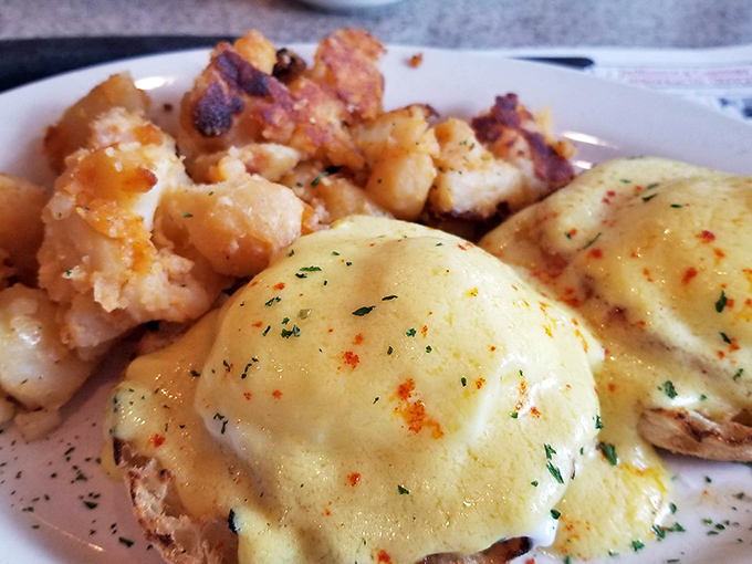 Eggs Benedict that would make the Pope jealous&mdash;hollandaise sauce cascading down English muffins like a yellow waterfall of breakfast bliss.
