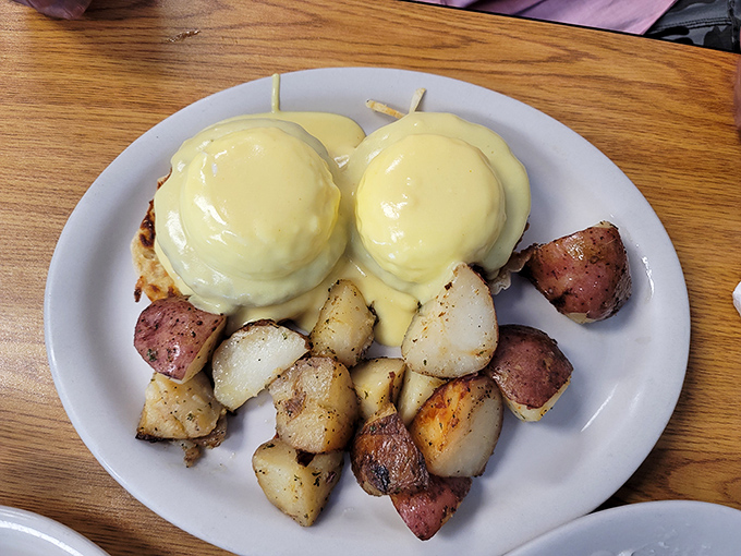 Eggs Benedict that would make a brunch snob weep with joy. The hollandaise sauce has that perfect balance—rich without being overwhelming, like a good vacation.