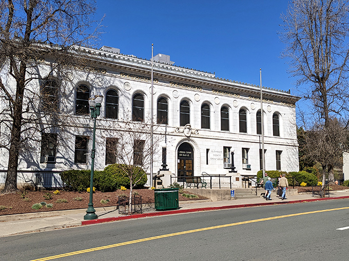 The stately El Dorado County Courthouse stands as a gleaming white monument to justice, where even parking tickets come with a side of architectural appreciation.