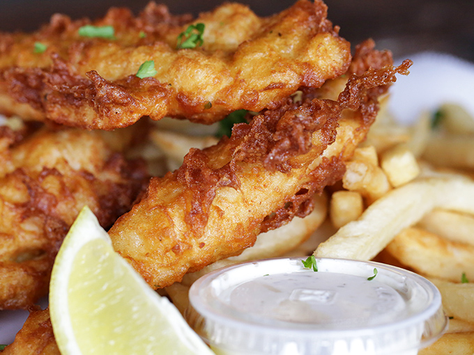 Golden battered fish meets crispy fries in a classic combination that never goes out of style.
