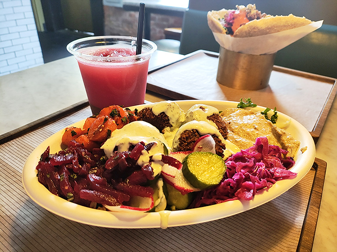 A rainbow of Mediterranean flavors arranged with the precision of a Picasso. This plate proves salads don't have to be punishment.