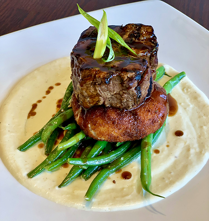 This filet mignon doesn't just sit on a plate&mdash;it's enthroned atop a royal cushion of potato, surrounded by a moat of green beans.