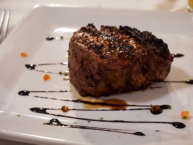 Behold the filet mignon in its natural habitat &ndash; perfectly seared, expertly seasoned, and ready to make your taste buds stand at attention.