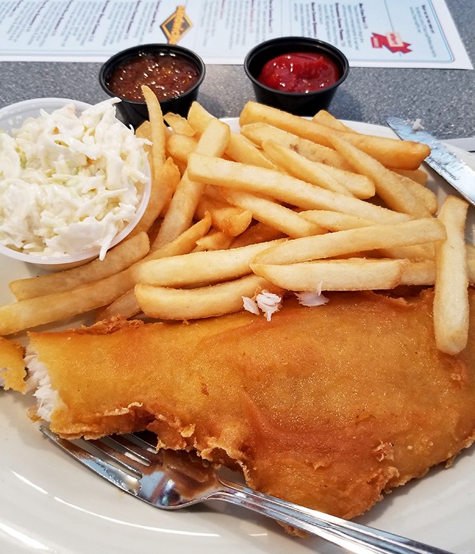 Fish and chips that would make a British pub proud. Golden, crispy batter protecting flaky white fish&mdash;a maritime marriage made in heaven.