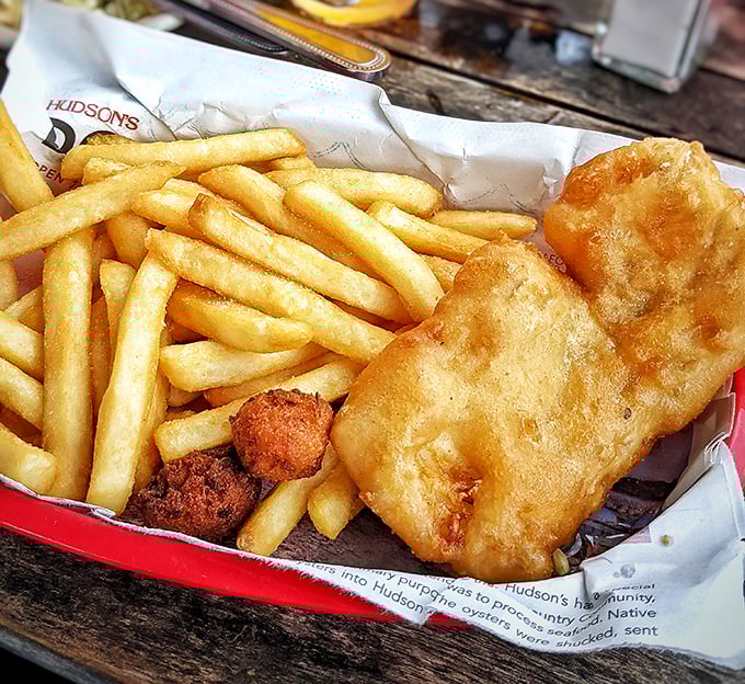 Fish and chips that would make a British pub jealous. The golden batter whispers "vacation" with every perfectly crispy bite.
