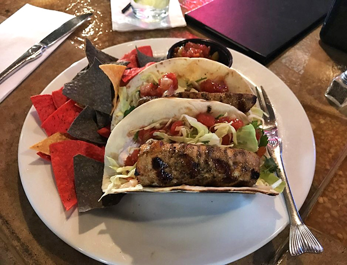 Fish tacos that make you question why you ever settled for lesser versions. The colorful slaw provides the perfect crunch counterpoint to the tender fish.