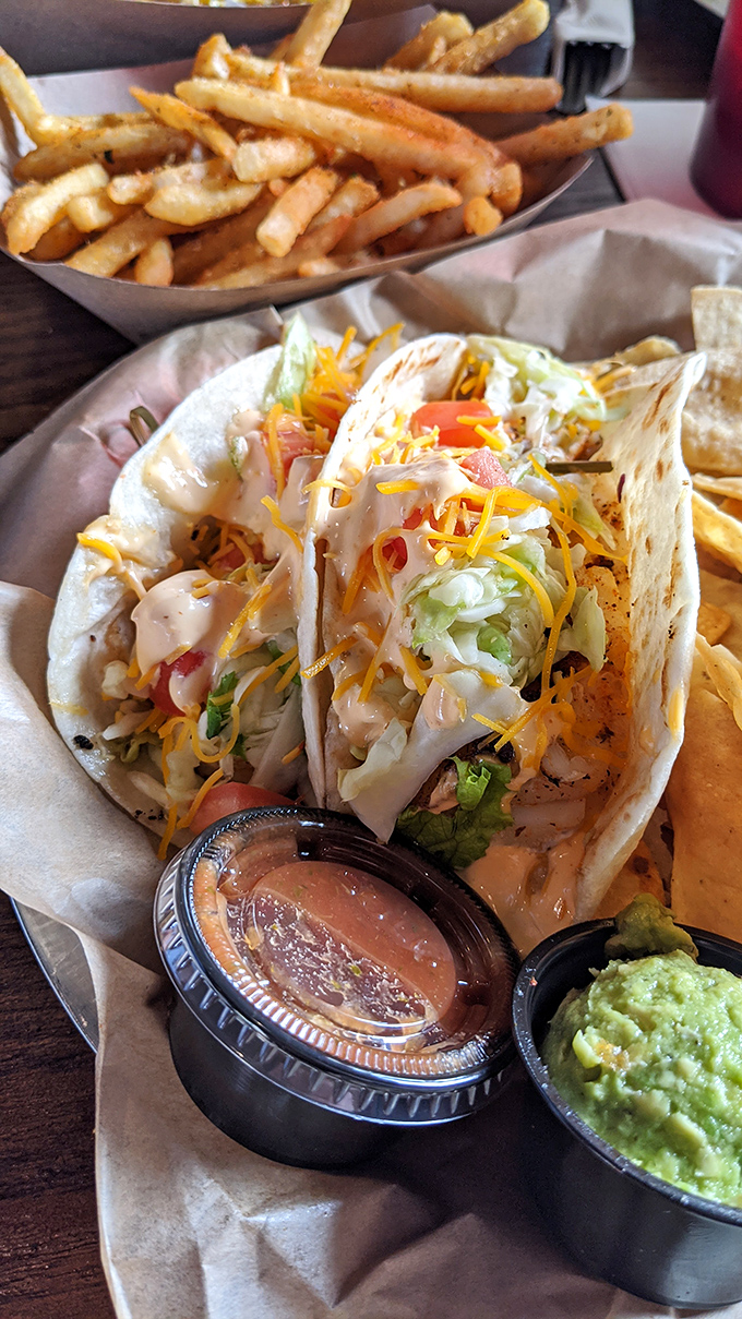 Fish tacos that make you question why you ever eat anything else. The colorful toppings aren't just garnish &ndash; they're confetti for your taste buds' celebration.