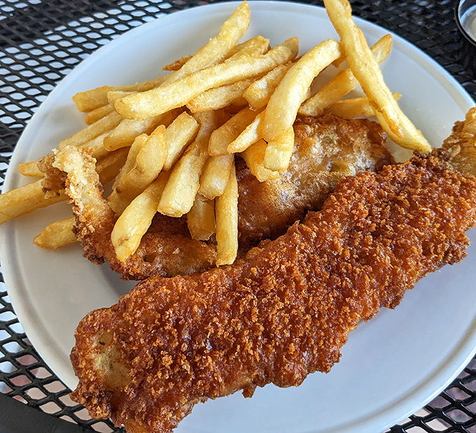 Fish and chips that would make a British pub jealous, with fries so perfectly golden they deserve their own Instagram account.