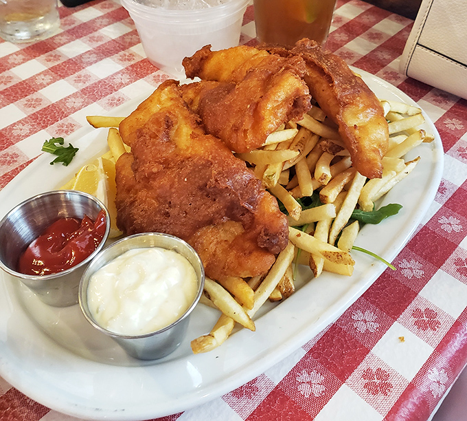 Golden fish and chips that would make any British pub weep with envy and admiration.