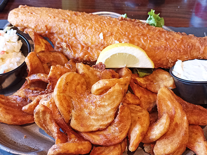 Fish so perfectly golden-battered it belongs in Fort Knox. Those homemade chips could make a British expat weep with joy.