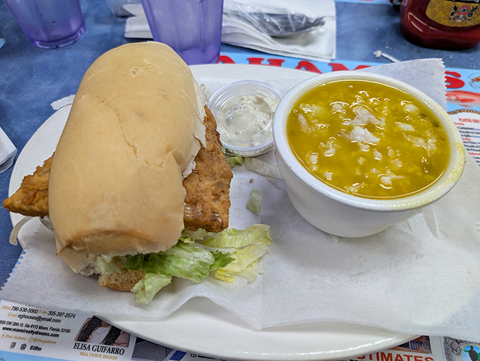 The fish sandwich and seafood soup combo: Miami's version of surf and turf that'll make you question your loyalty to burgers forever.
