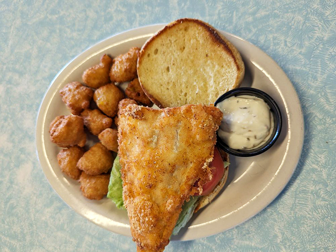 The fish sandwich that launched a thousand return trips. Those golden tater tots aren't just a side&mdash;they're little potato treasures worth the drive alone.
