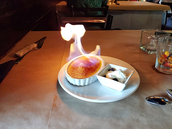 Nothing says "grand finale" quite like cr&egrave;me br&ucirc;l&eacute;e arriving with its own personal fireworks show.